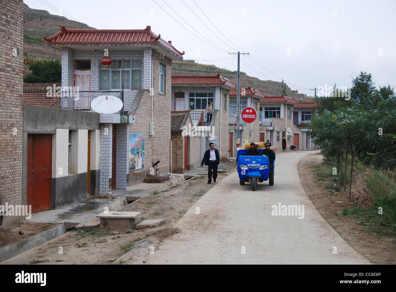 locals driving tractor in the village, Dingxi, Gansu , China Stock ...