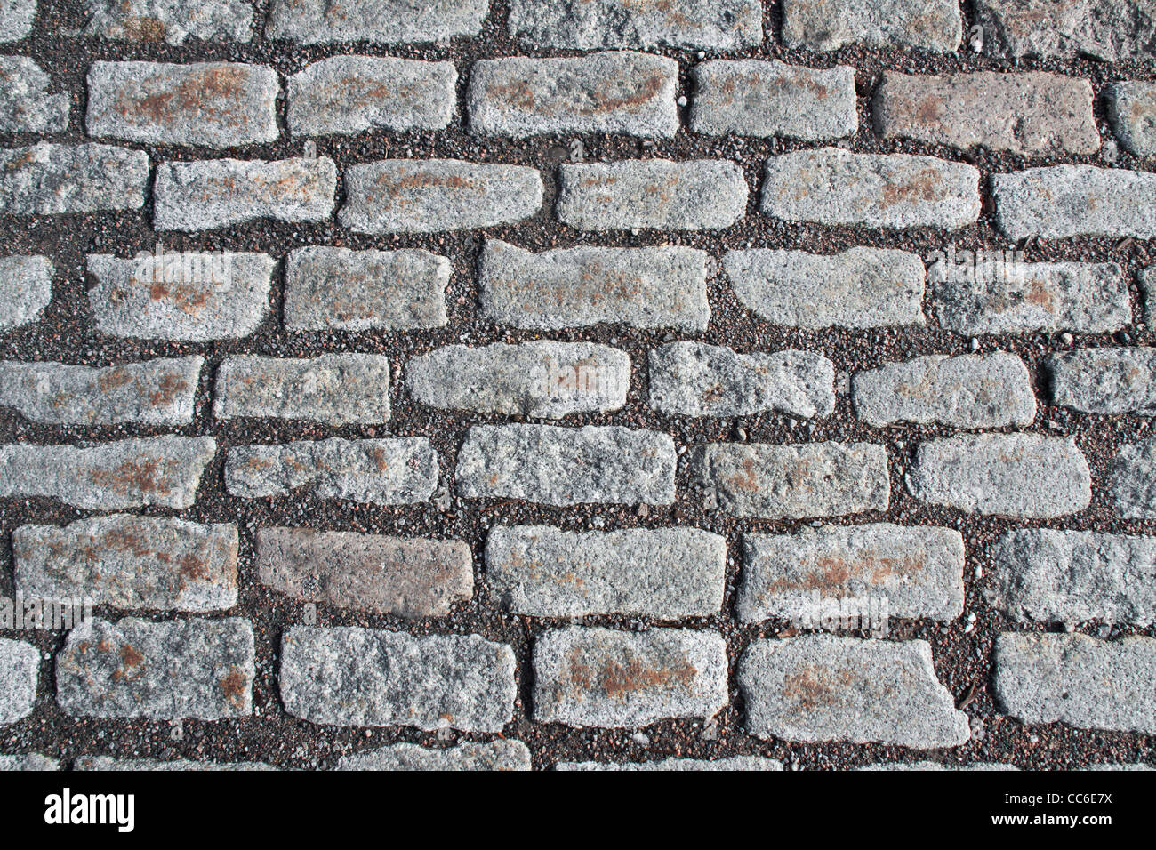 Natural gray granite stone pavement background Stock Photo - Alamy