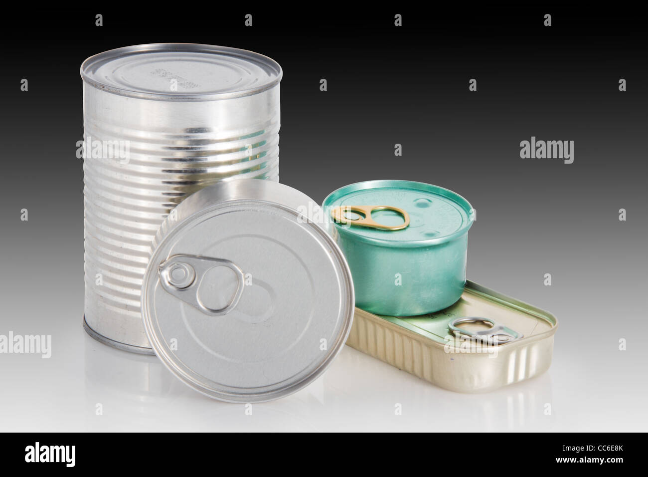 Four different shape and colors cans with a gradient background Stock ...