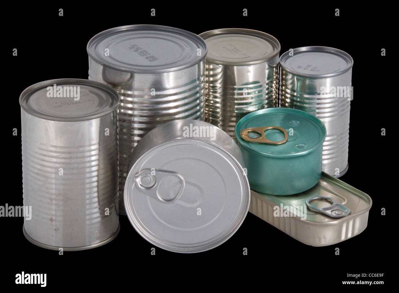Seven different shape and colors cans isolated in black Stock Photo - Alamy