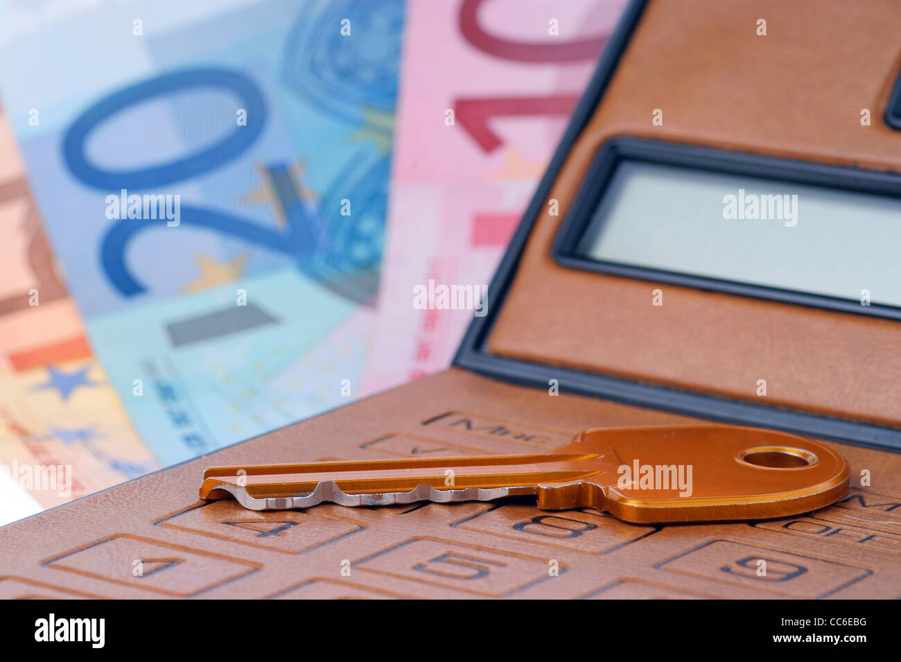 calculator key and euromoney note, bill Stock Photo - Alamy