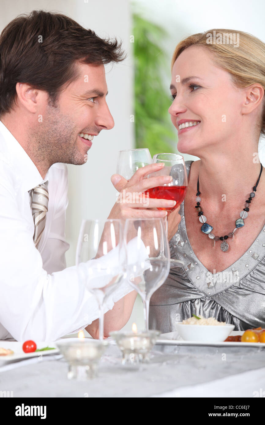 couple at table Stock Photo - Alamy