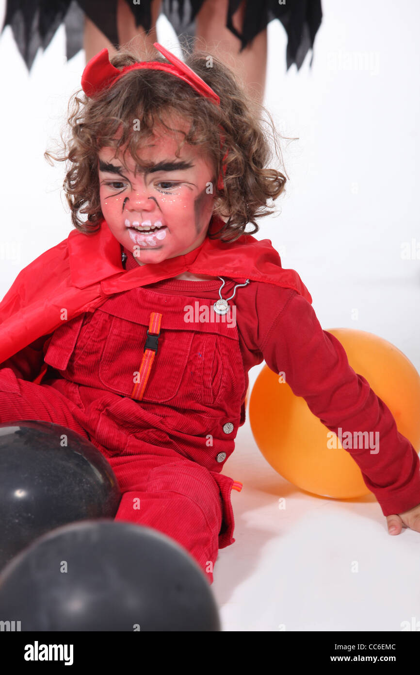 Little boy dressed as devil Stock Photo - Alamy