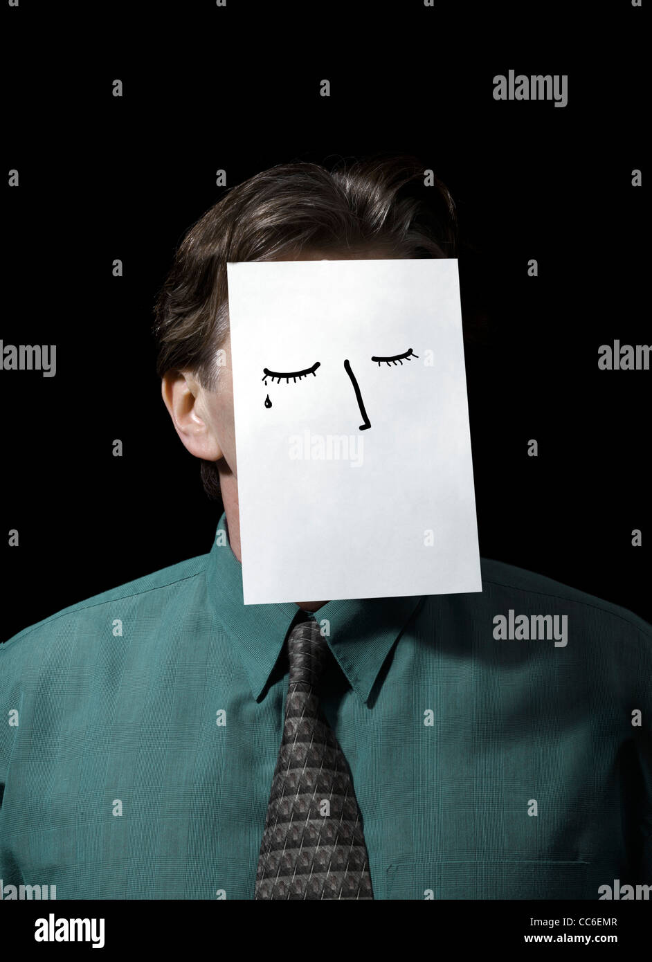 Businessman with Paper drawing over Face Stock Photo - Alamy