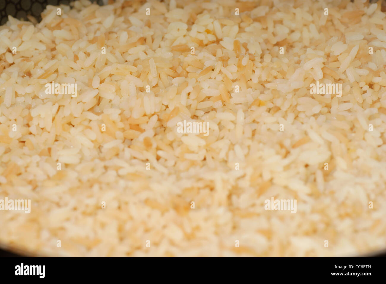 rice on frying pan, skillet Stock Photo - Alamy