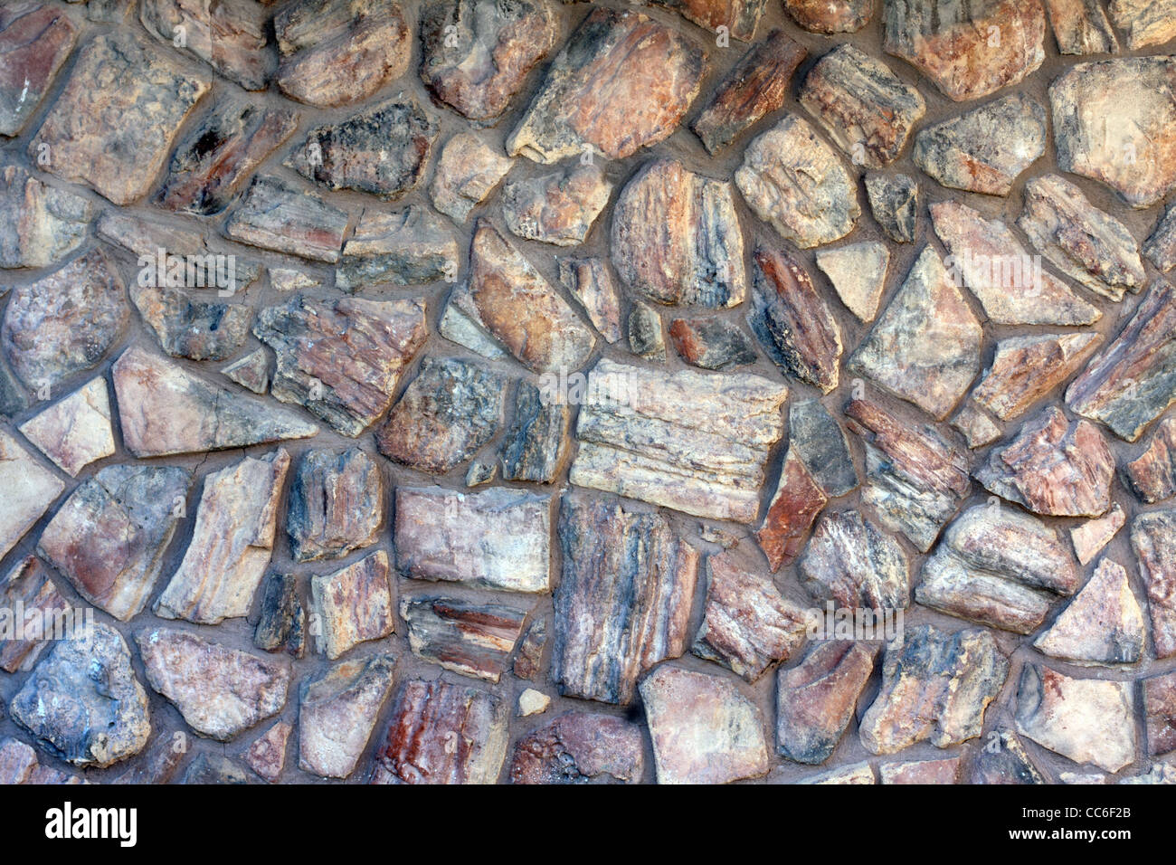 cobblestone wall with natural stone rock veneer Stock Photo - Alamy