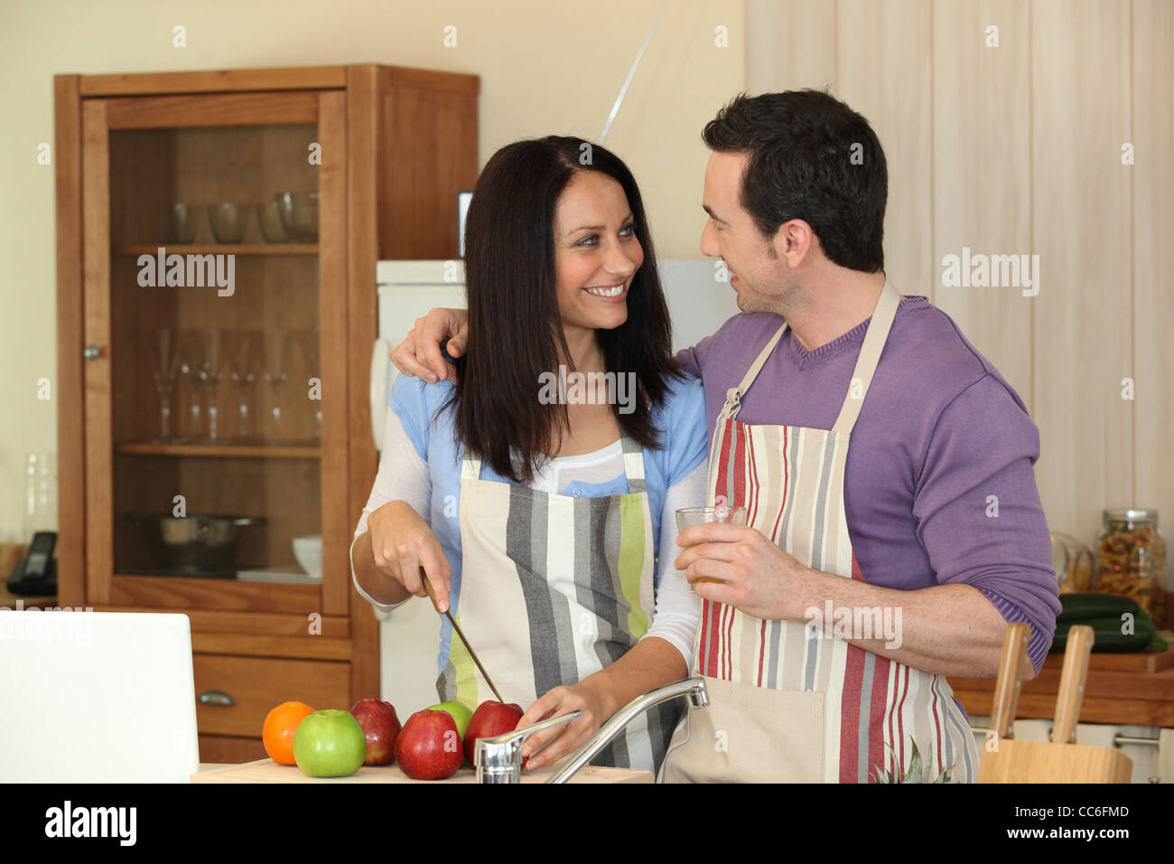 Couple having fun cooking together Stock Photo - Alamy