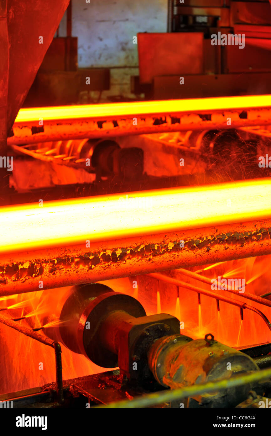 hot steel on conveyor Stock Photo - Alamy