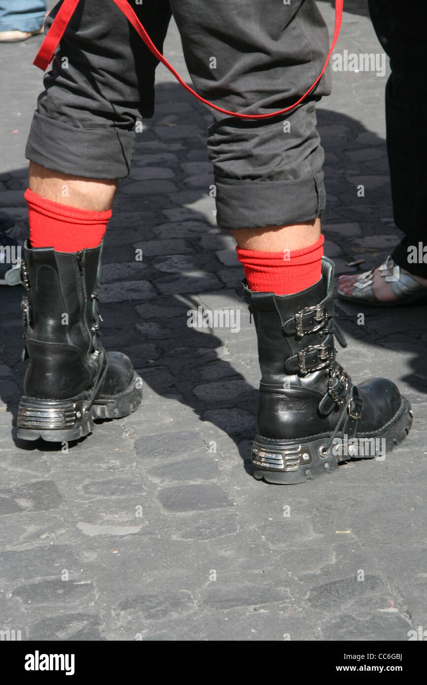 young man wearing black leather boots Stock Photo - Alamy