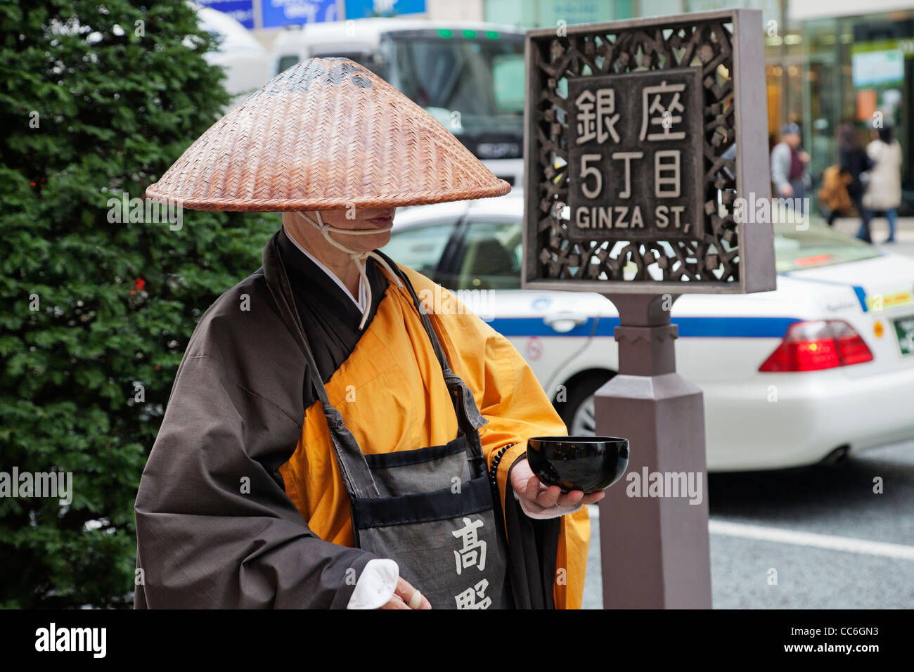 Japan, Tokyo, Ginza, Monk Collecting Alms Stock Photo - Alamy