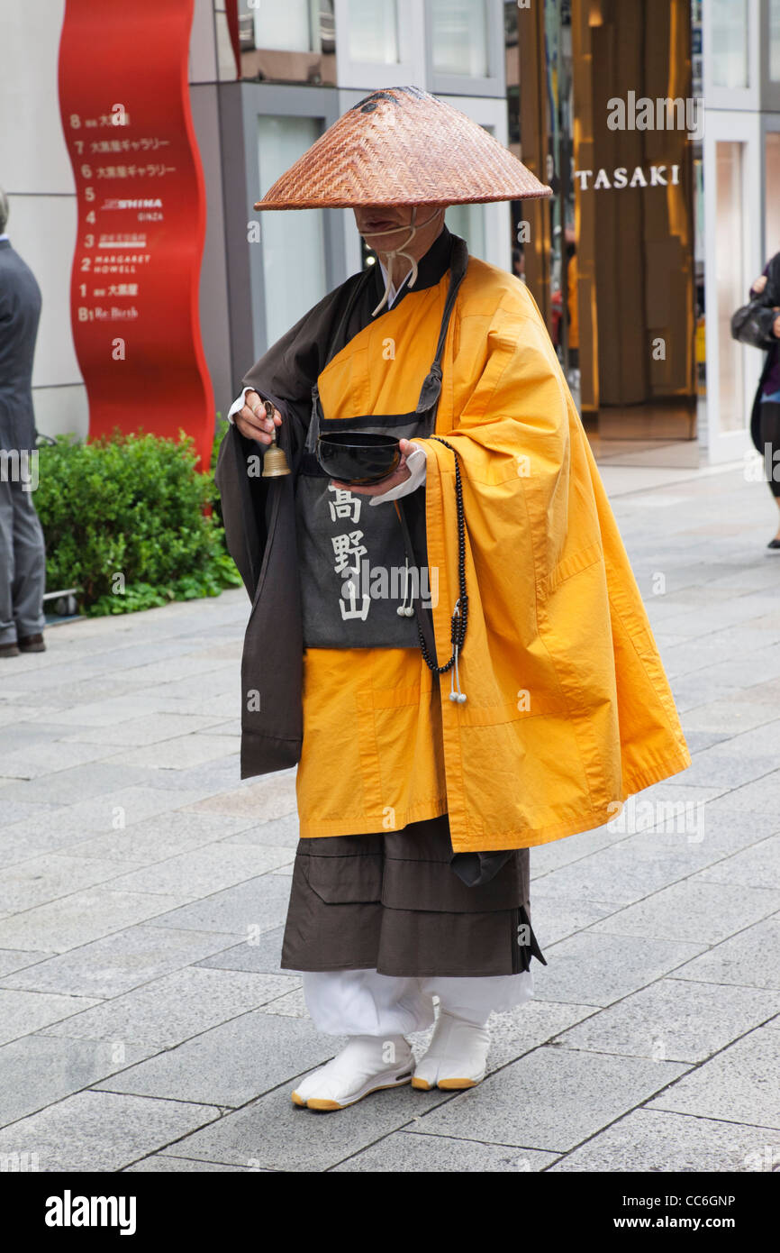 Japan, Tokyo, Ginza, Monk Collecting Alms Stock Photo - Alamy