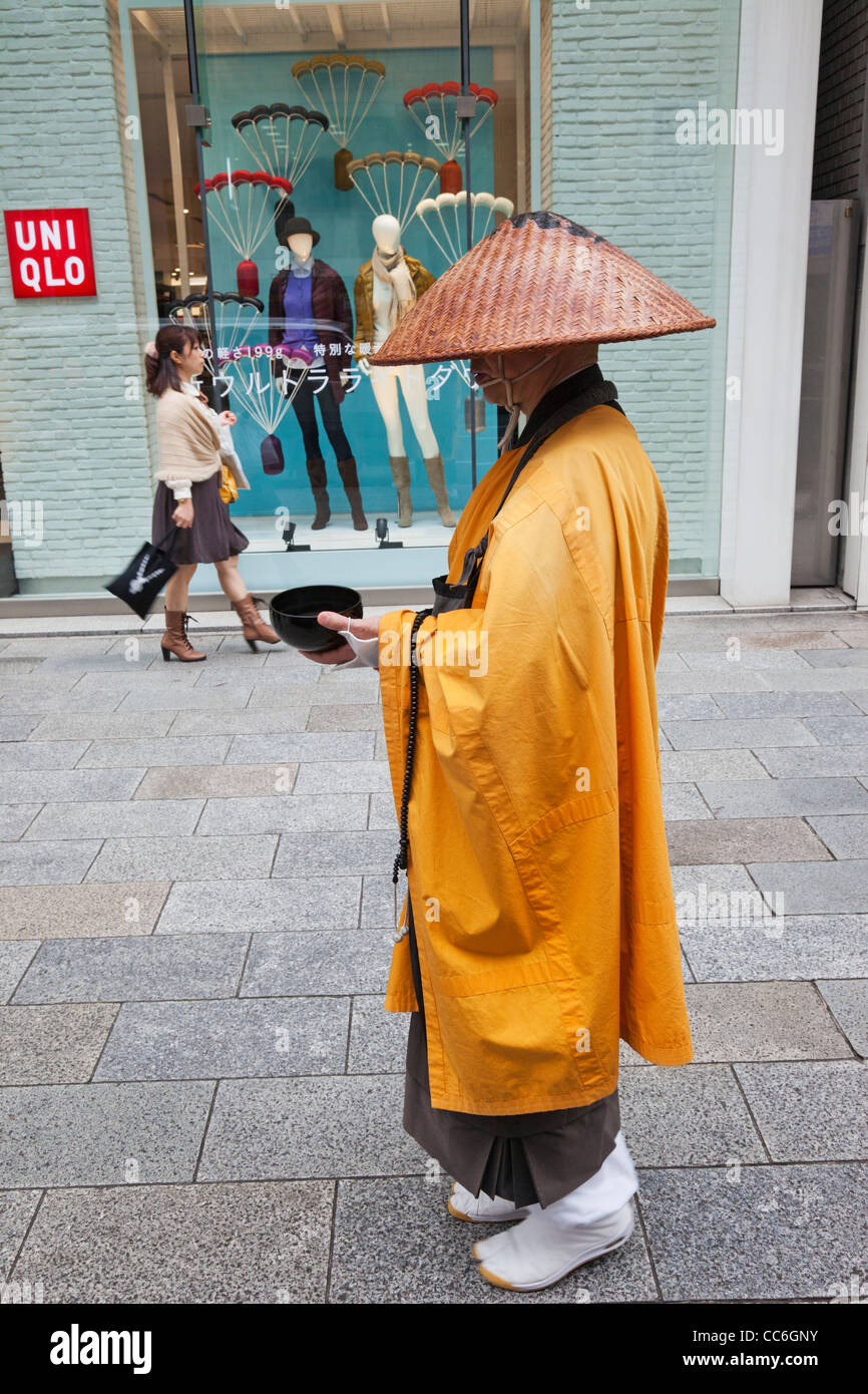 Japan, Tokyo, Ginza, Monk Collecting Alms Stock Photo - Alamy