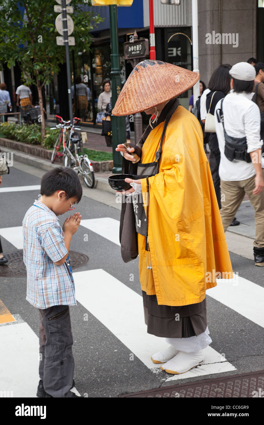 Japan, Tokyo, Ginza, Monk Collecting Alms Stock Photo - Alamy