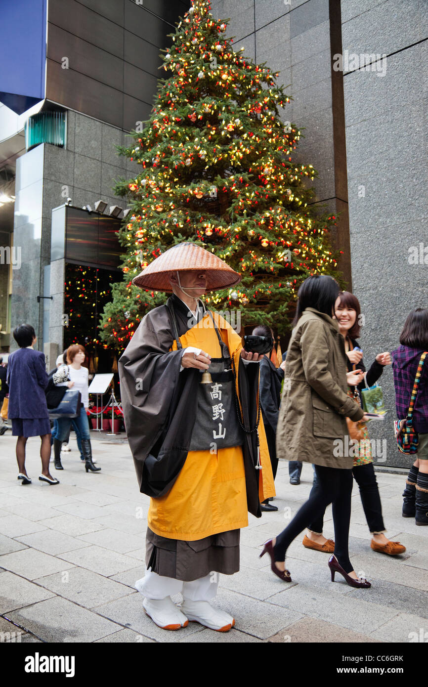 Japan, Tokyo, Ginza, Monk Collecting Alms Stock Photo - Alamy