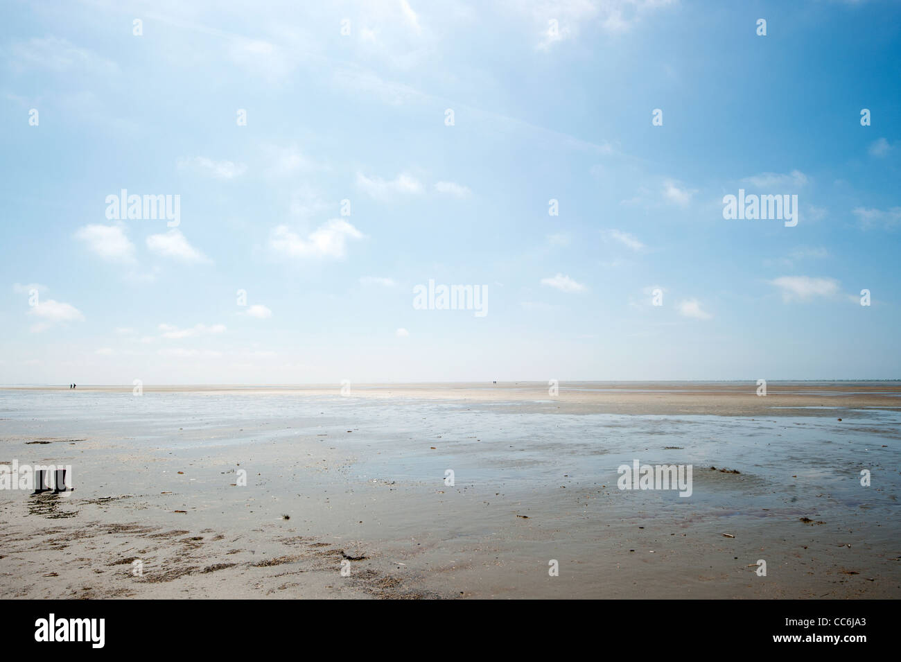 Gumboots in the mud on the beach of Fano island, Northsea, Denmark ...