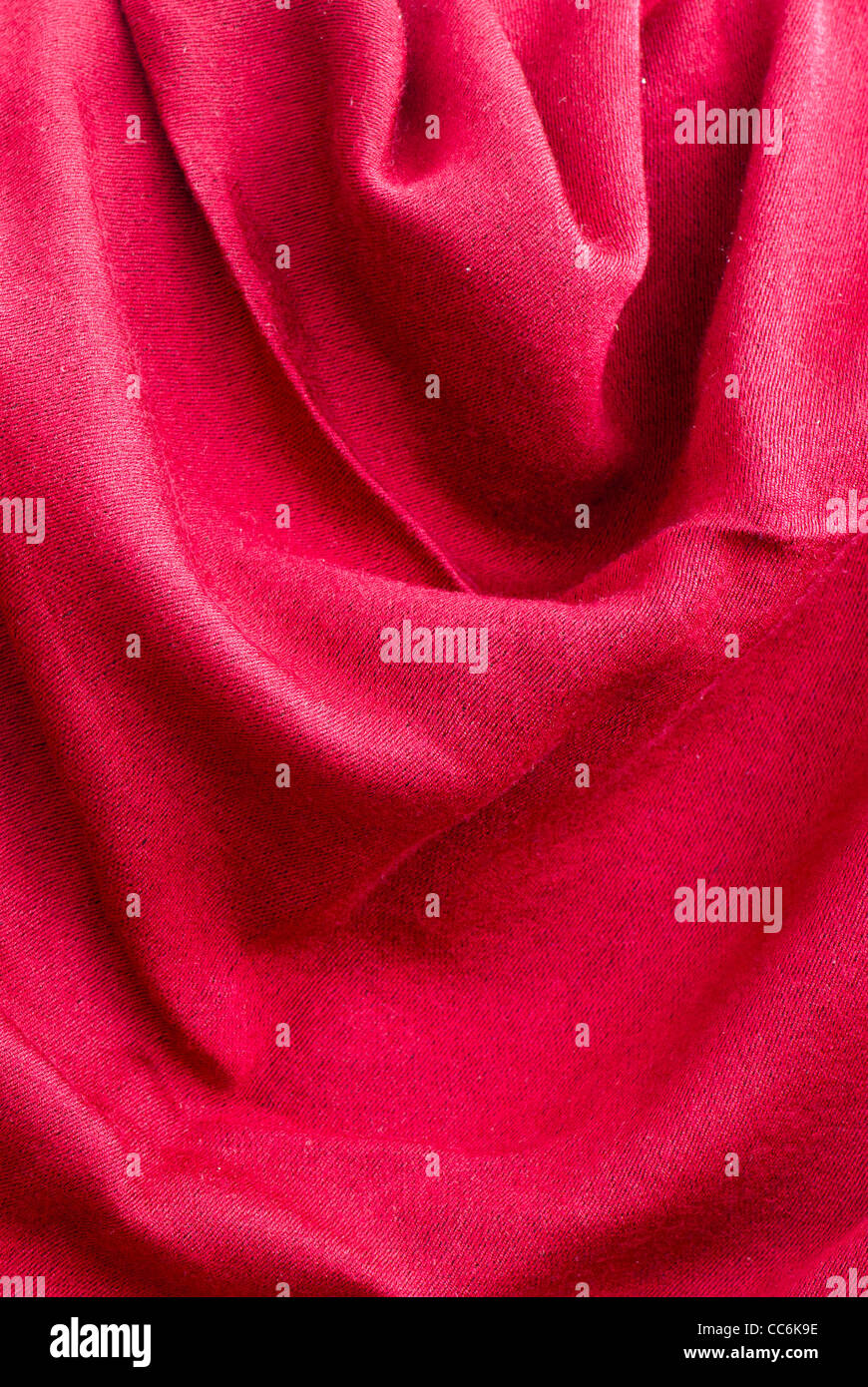 Folded red fabric Stock Photo - Alamy