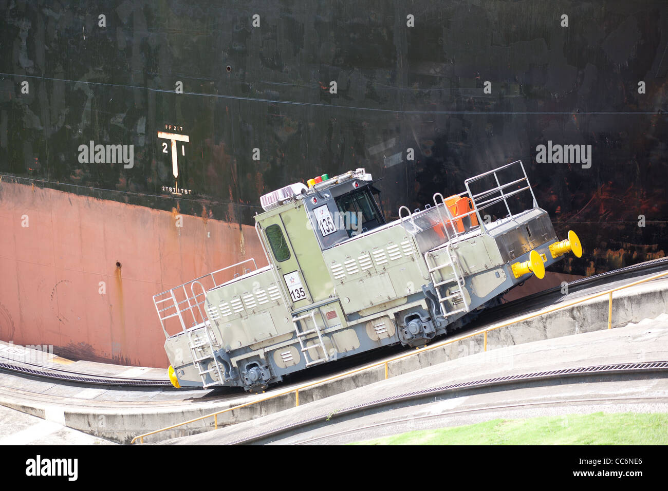 Ship in transfer through the Panama canal with the help from a ...