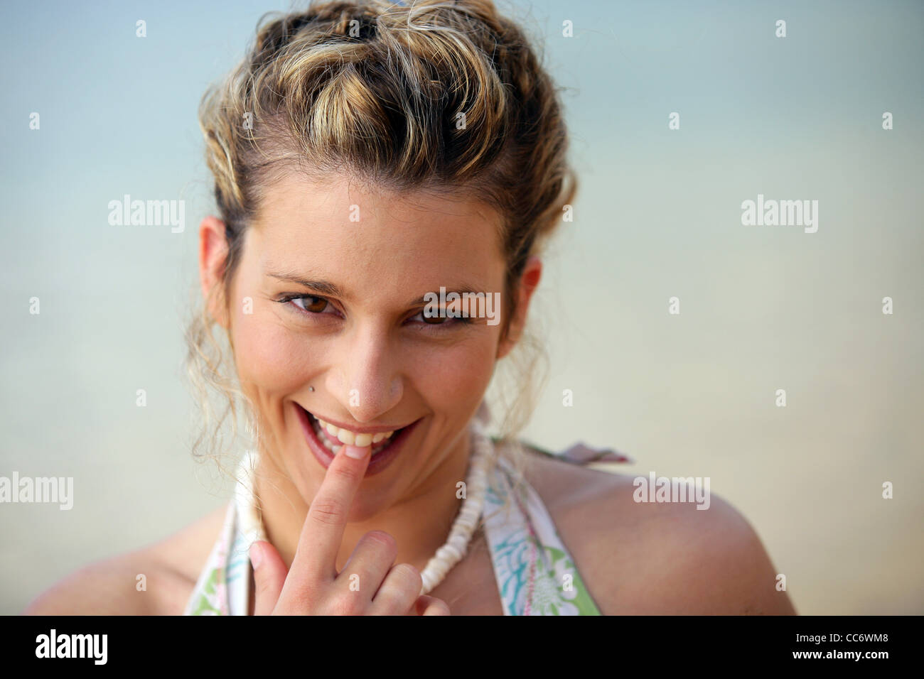 Portrait of playful woman Stock Photo - Alamy