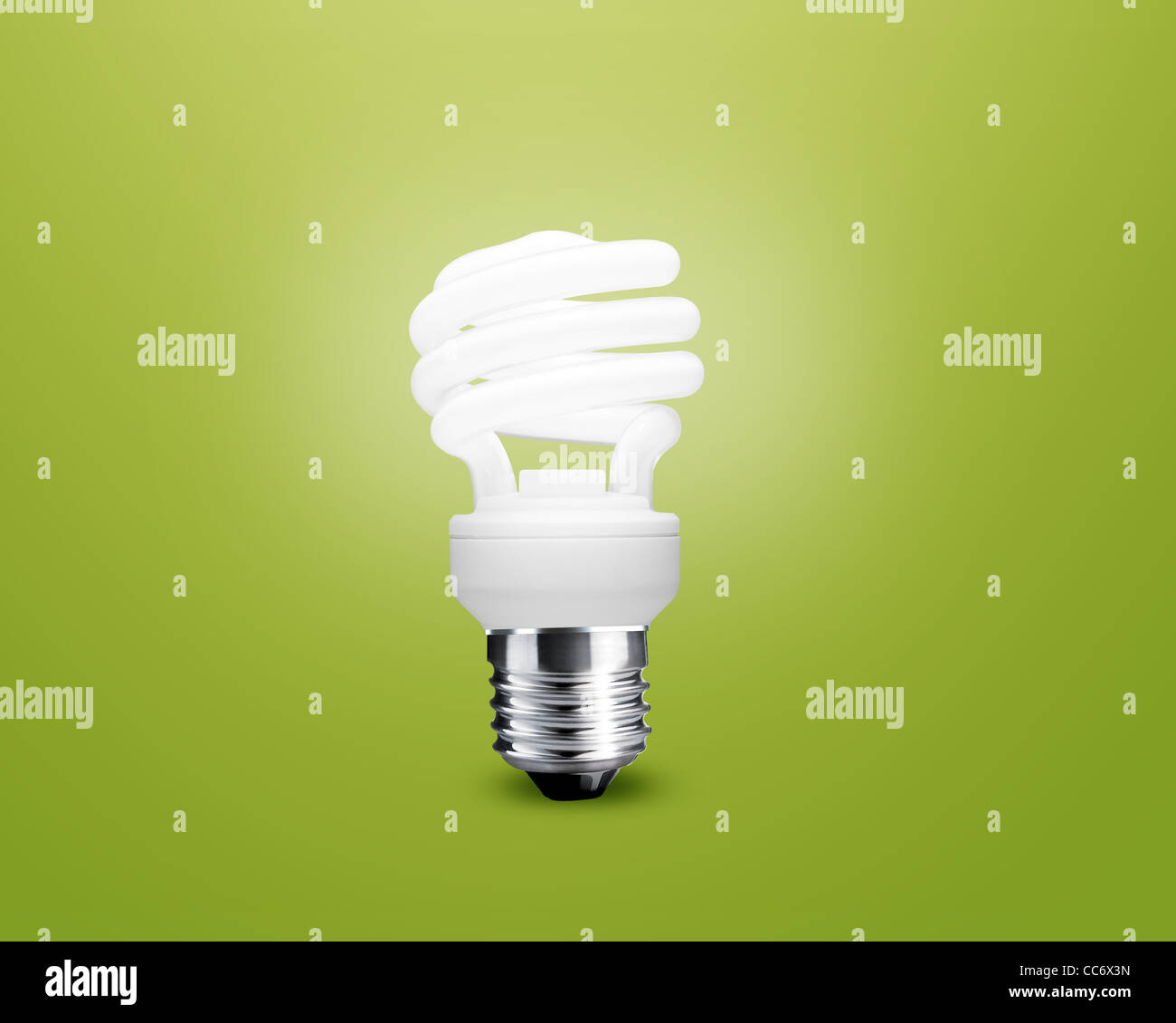 glowing Light bulb idea on green background Stock Photo - Alamy