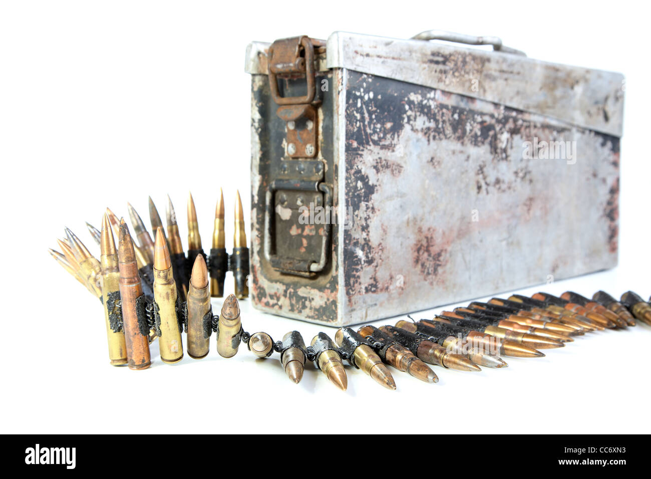 Machine-gun tape with cartridges of times Second World War on a white ...