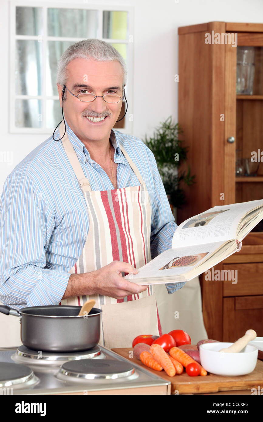 Man cooking meal Stock Photo - Alamy