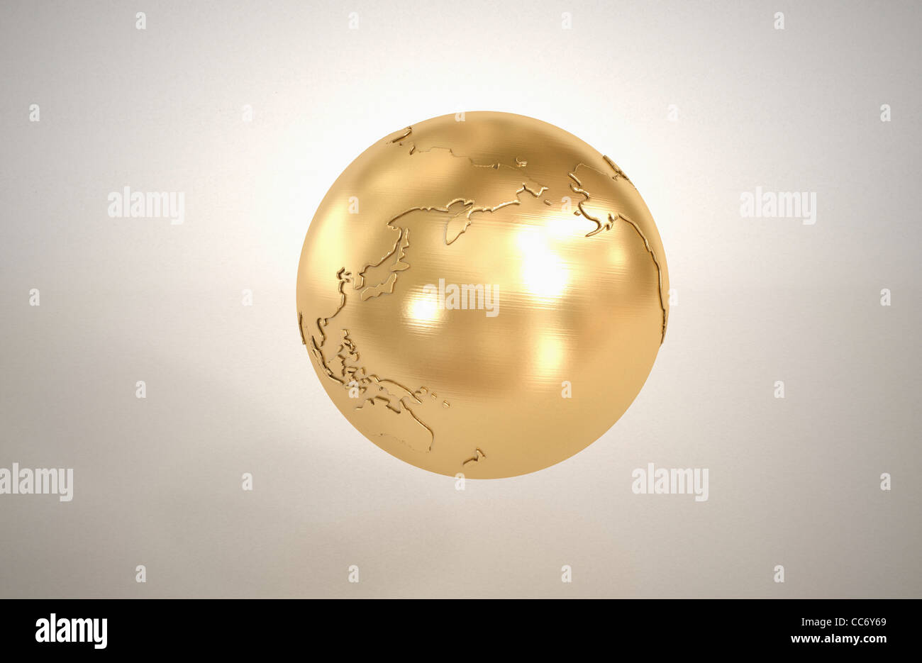 The gold globe with gray background Stock Photo - Alamy
