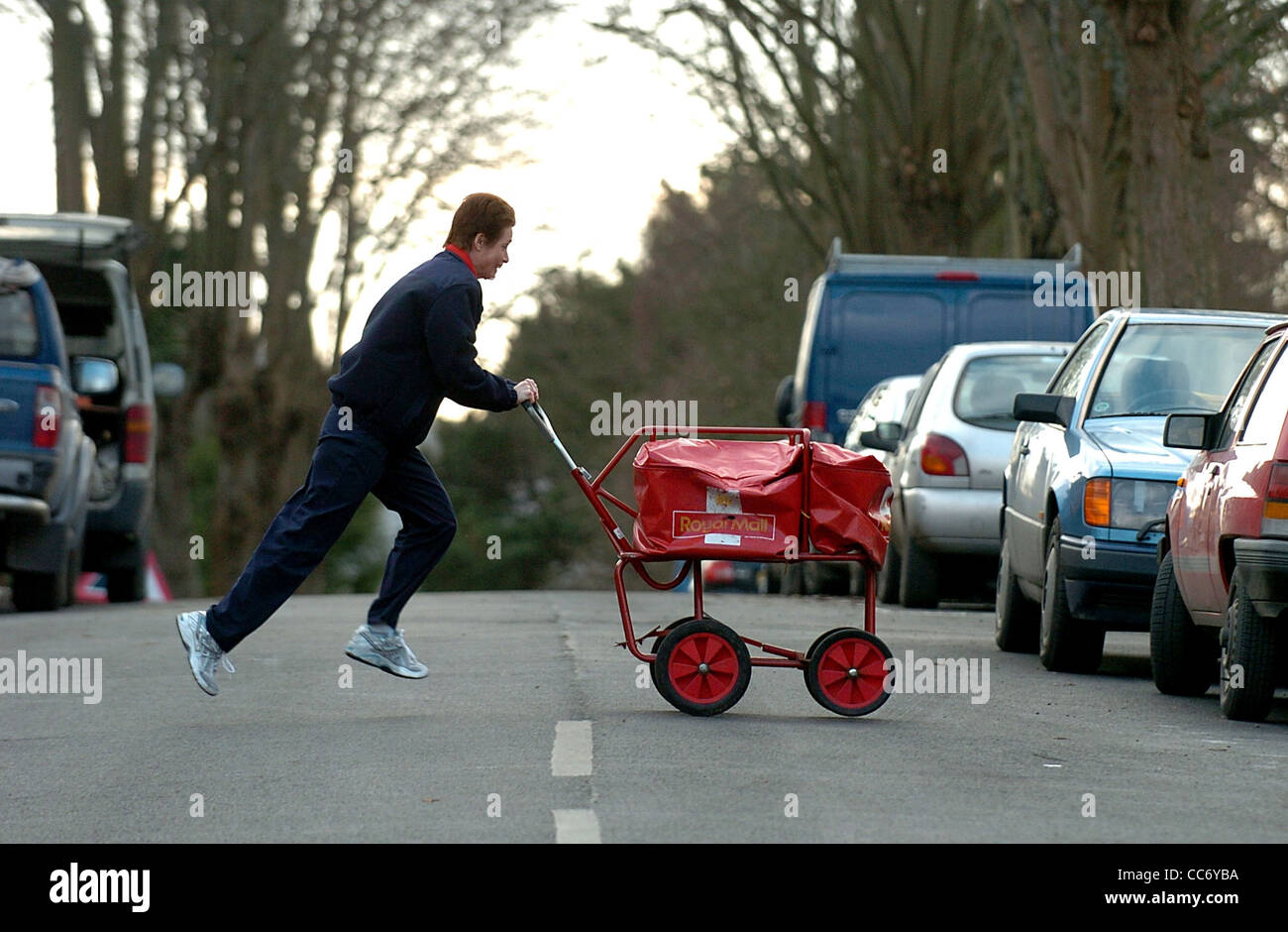 Woman posting letter in post hi-res stock photography and images - Alamy