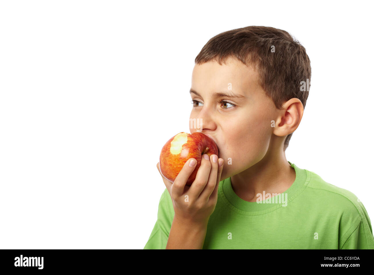 Kid with red apple isolated on white background Stock Photo - Alamy