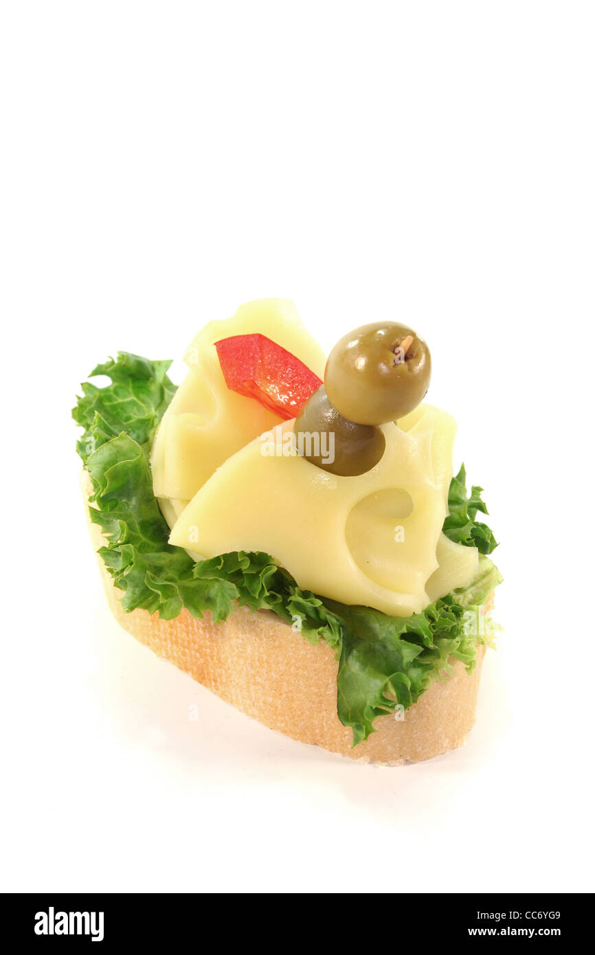 Canape with lettuce, cheese, peppers and olives Stock Photo - Alamy
