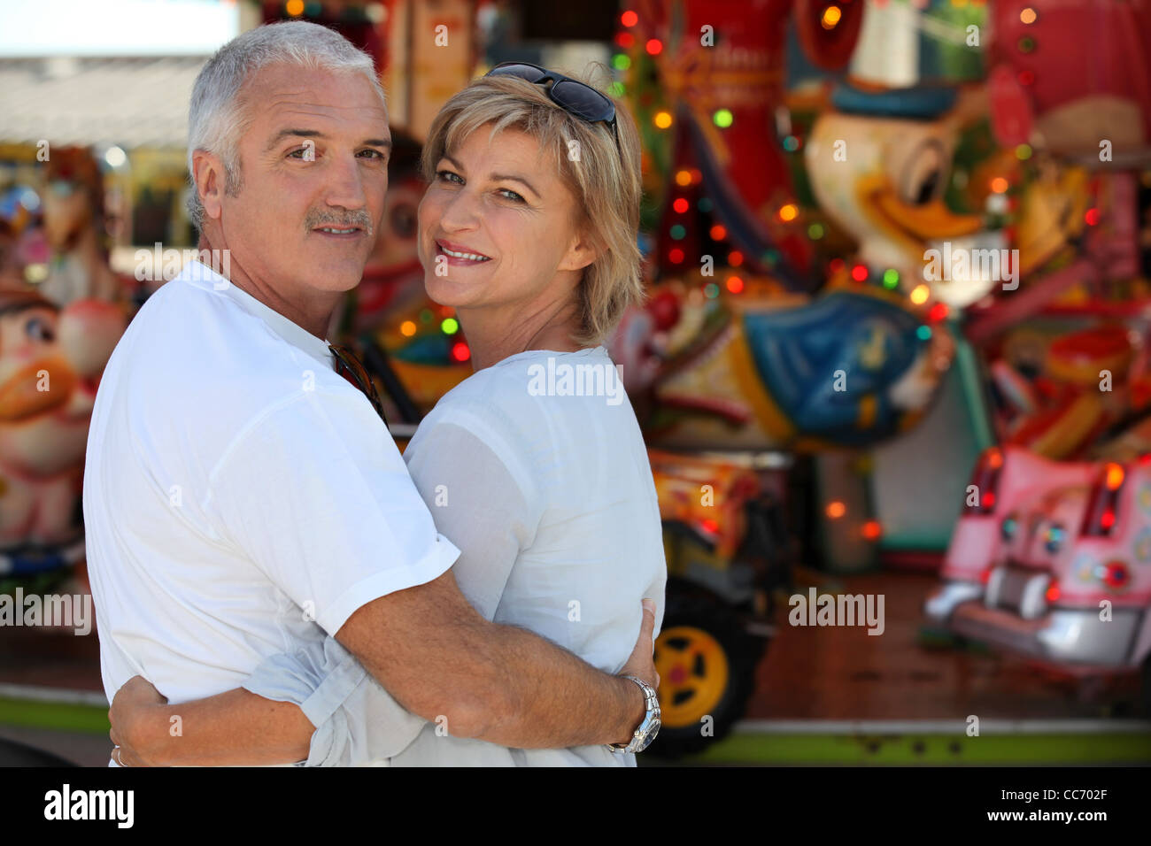 Couple at the fair together Stock Photo - Alamy
