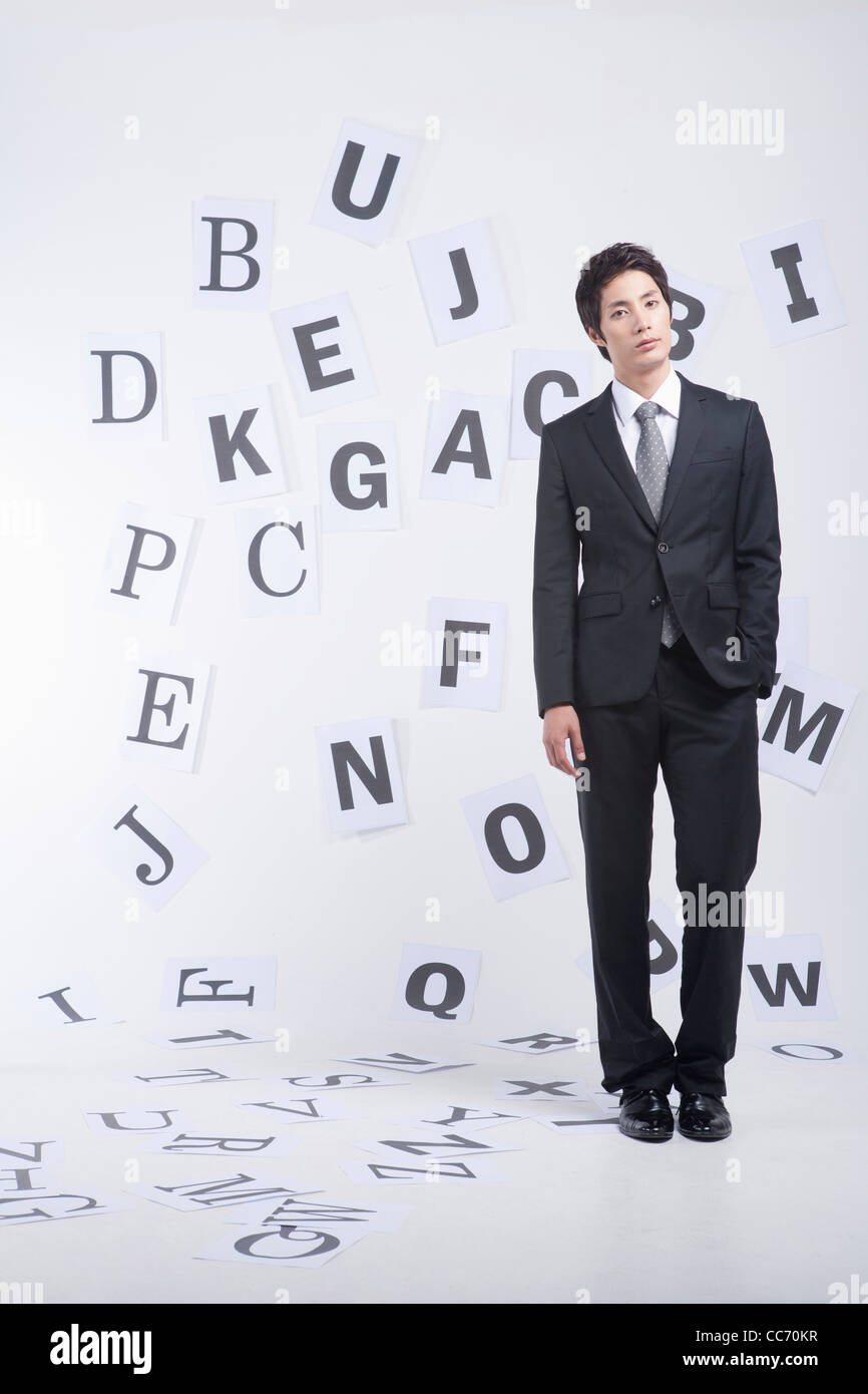 Man standing letter alphabet hi-res stock photography and images - Alamy