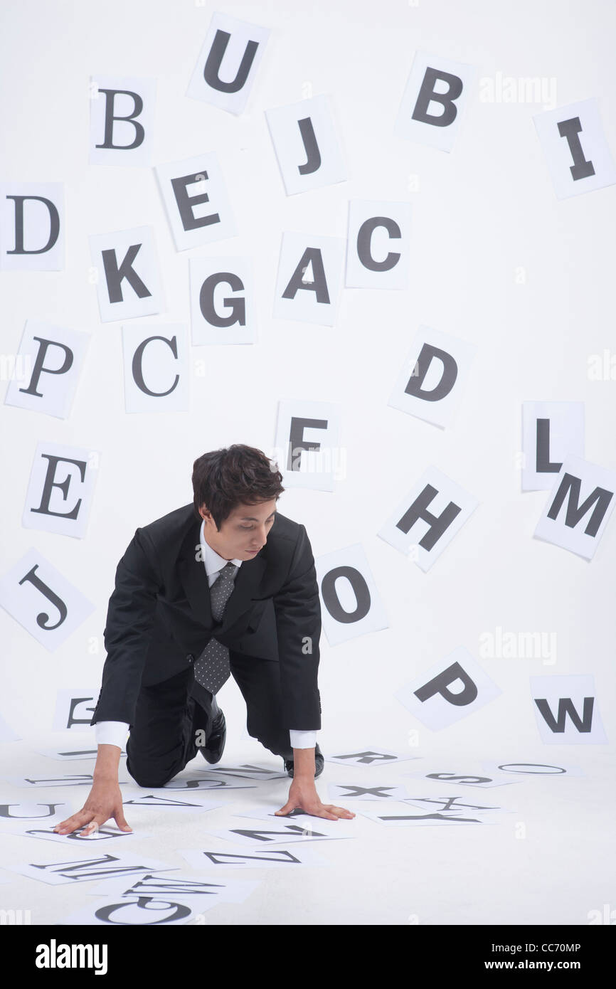 A man sitting down on the English letter written papers Stock Photo - Alamy