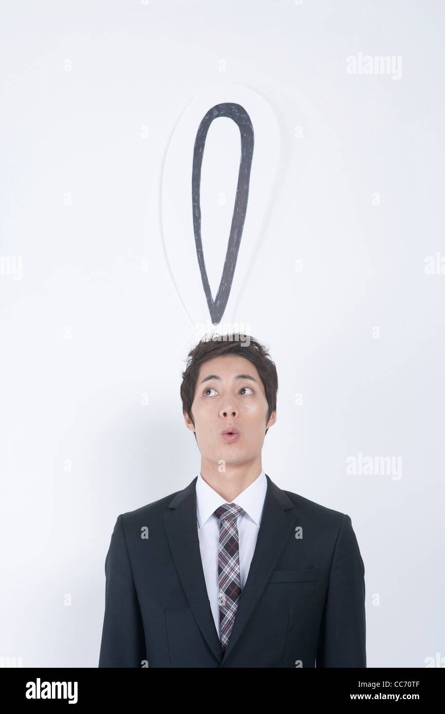 A man with exclamation mark Stock Photo - Alamy