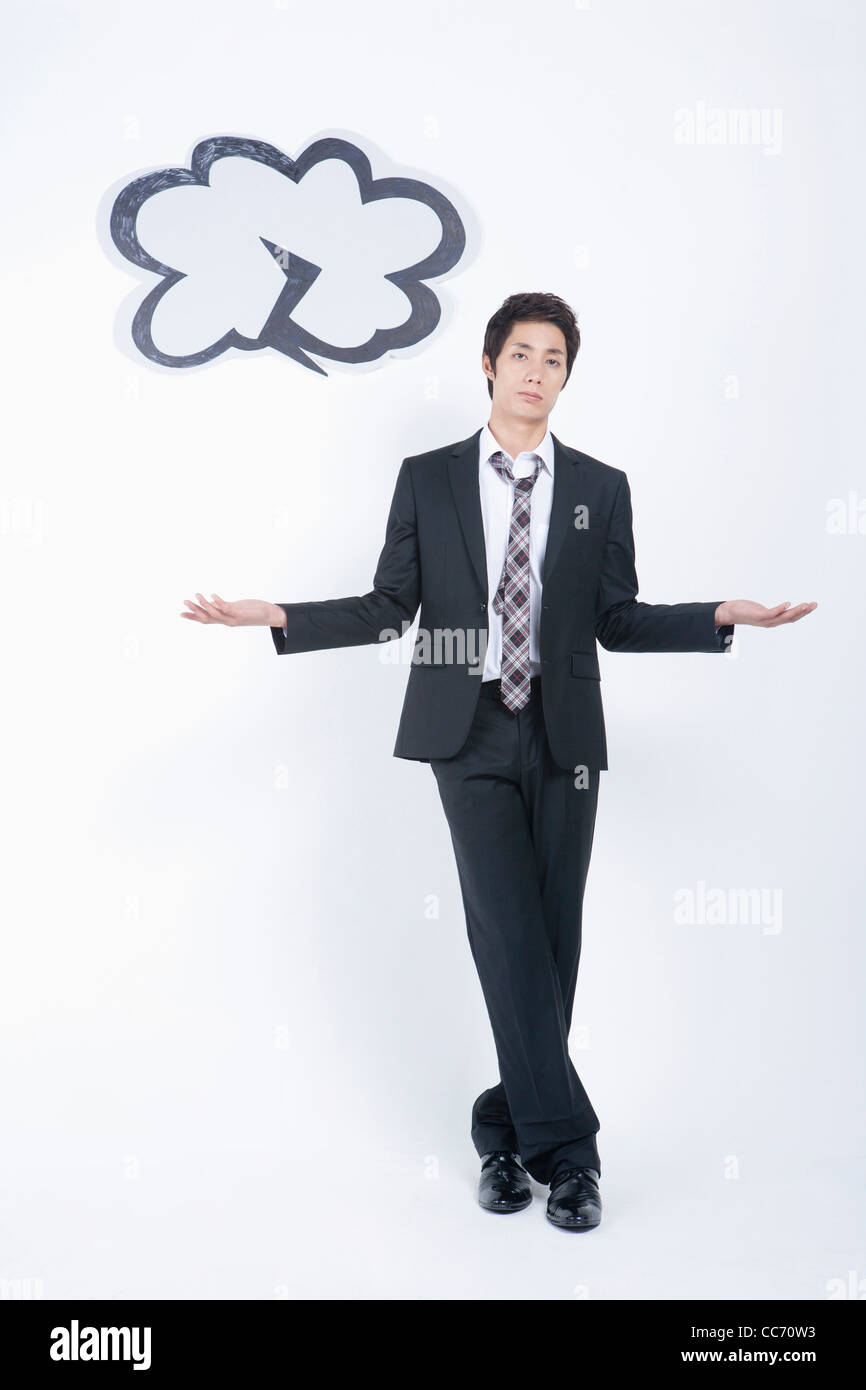 A stressful man having his arms open with dark lightening cloud Stock ...