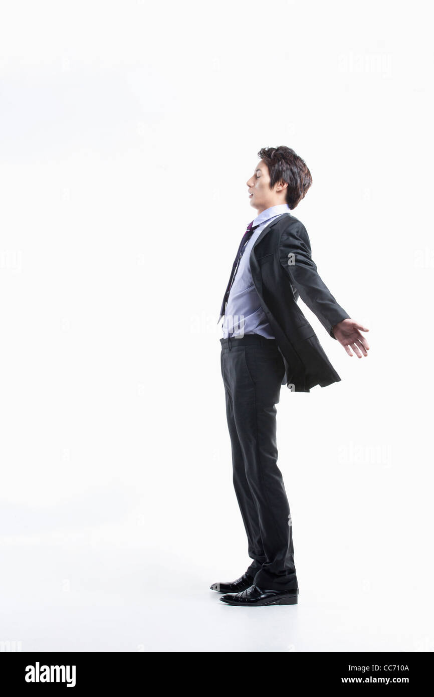 A man hard to walk forward hit by the wind Stock Photo - Alamy