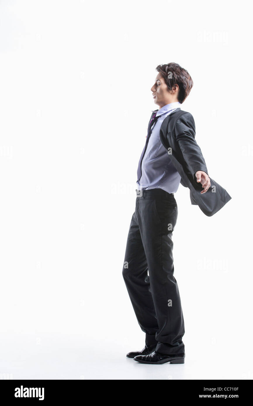 A man hard to walk forward hit by the wind Stock Photo - Alamy