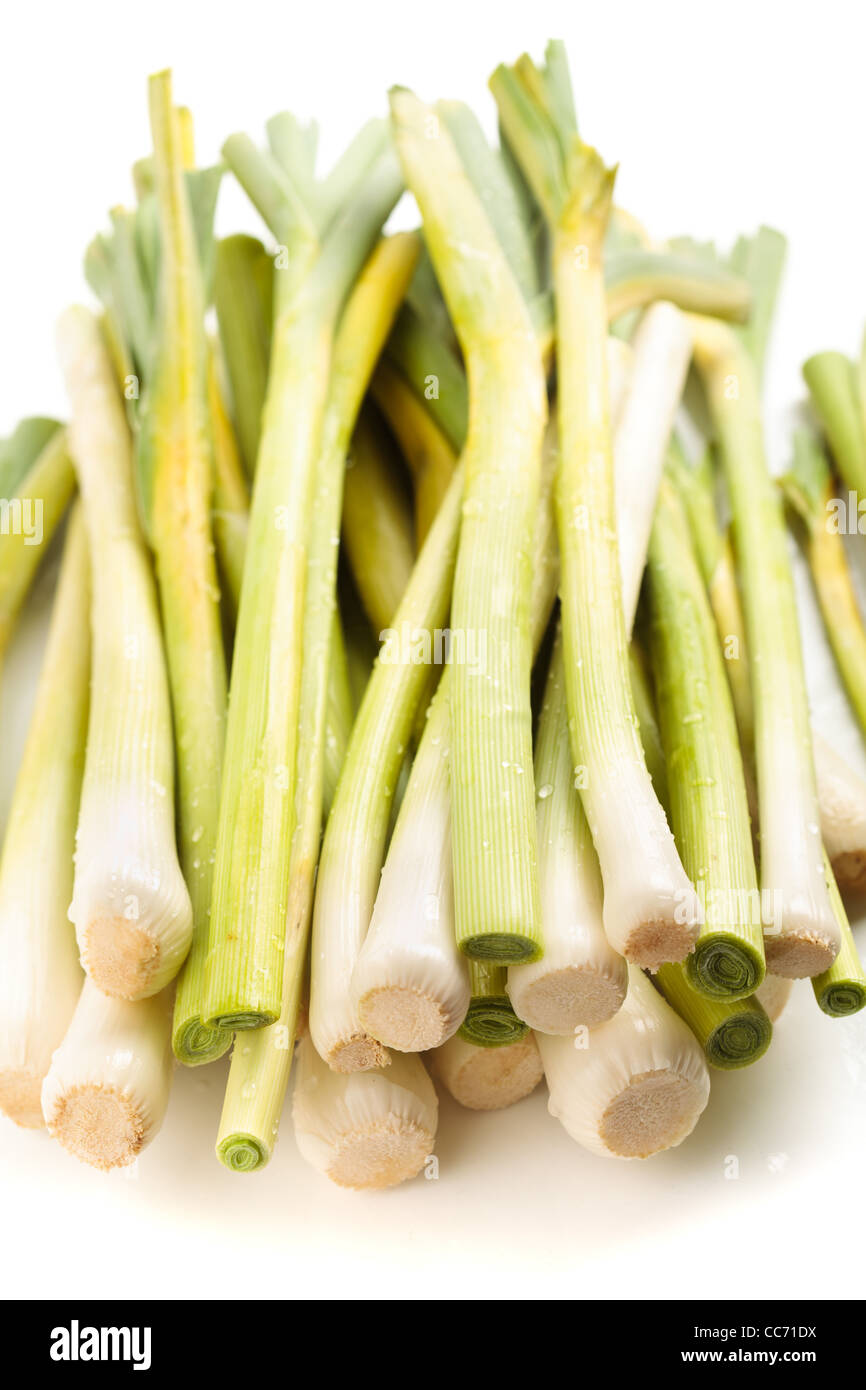 Closeup of freshly cut leek isolated on white background Stock Photo ...