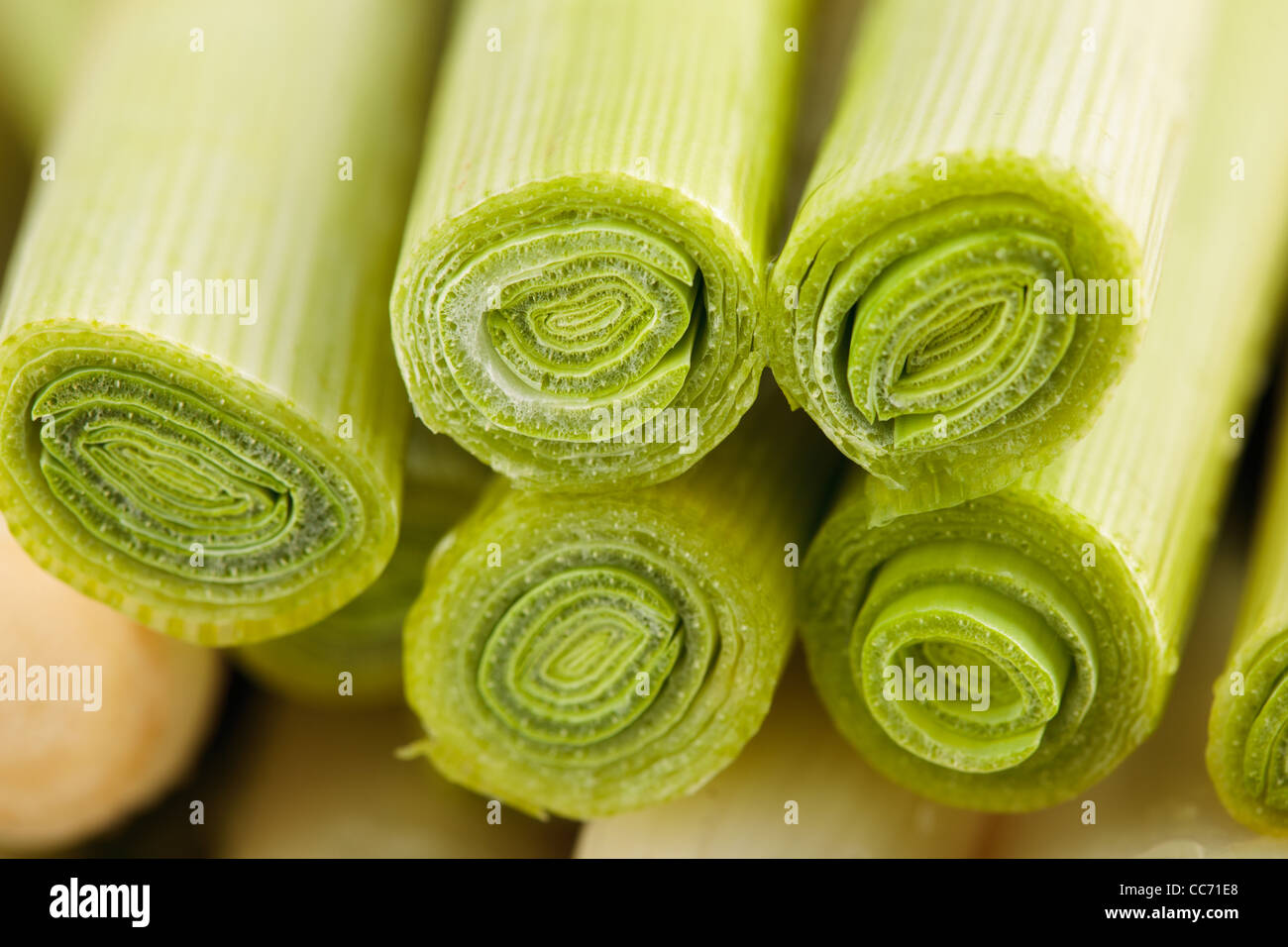 Closeup of freshly cut leek isolated on white background Stock Photo ...