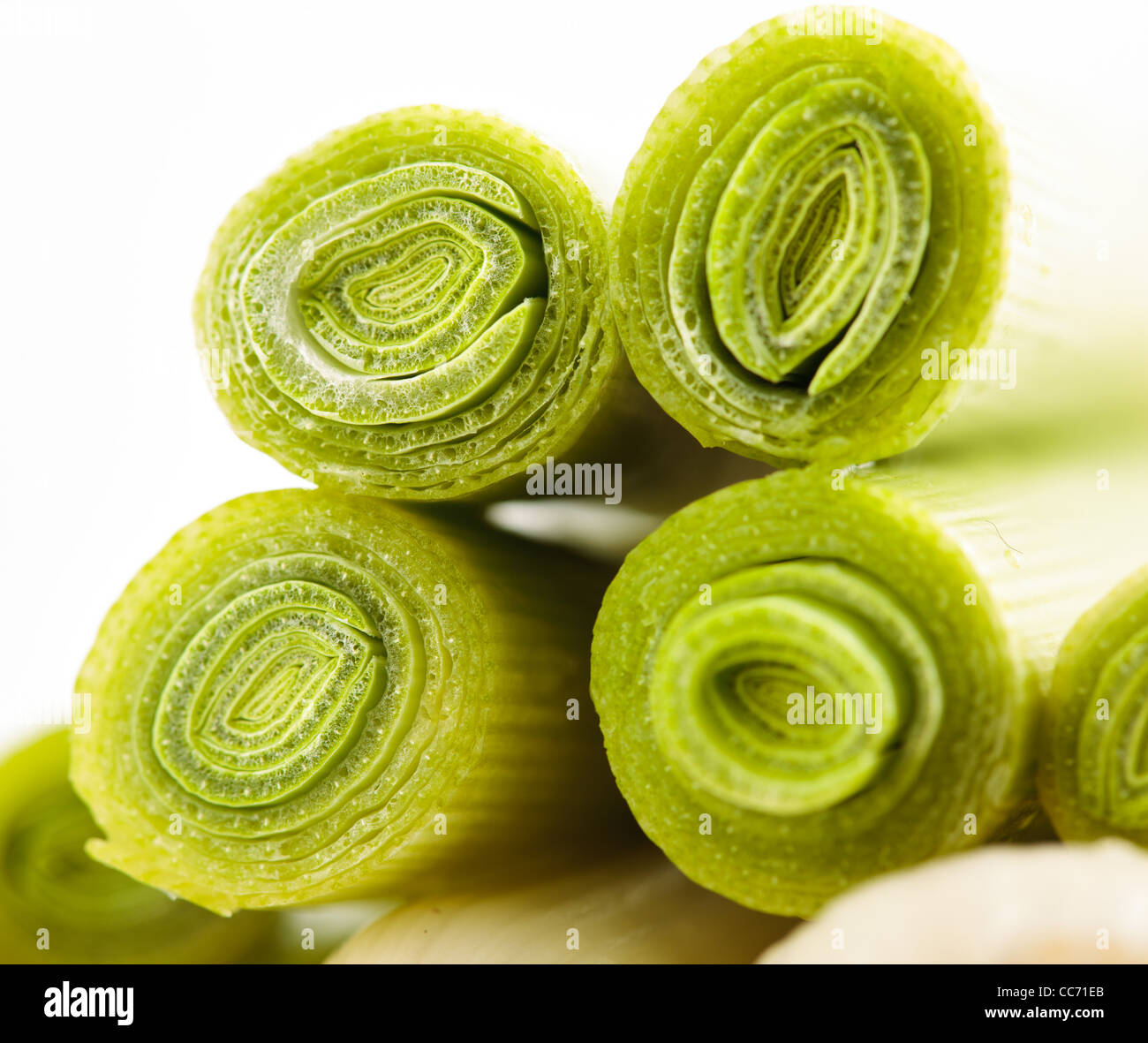 Closeup of freshly cut leek isolated on white background Stock Photo ...