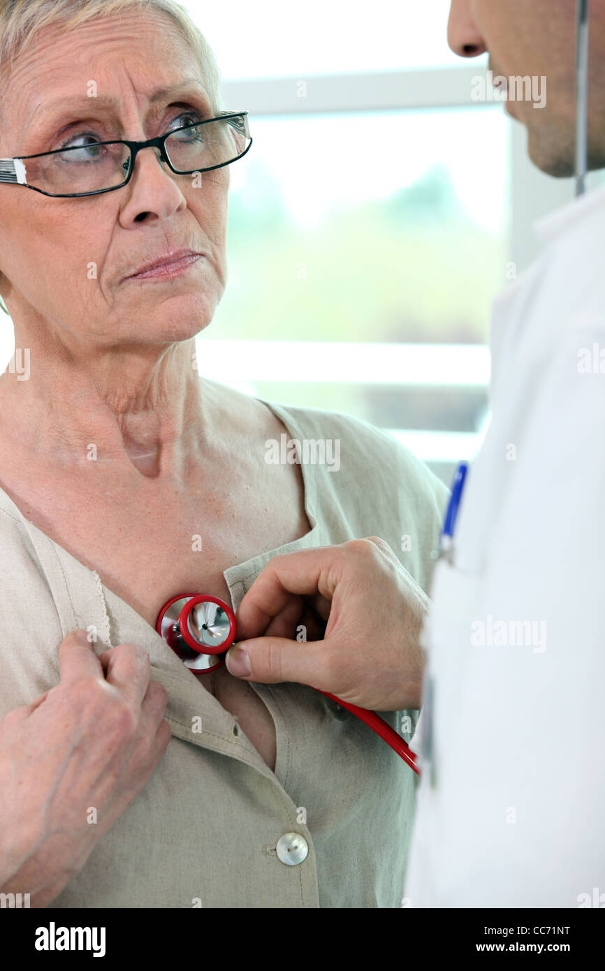 Doctor old womans heart hi-res stock photography and images - Alamy