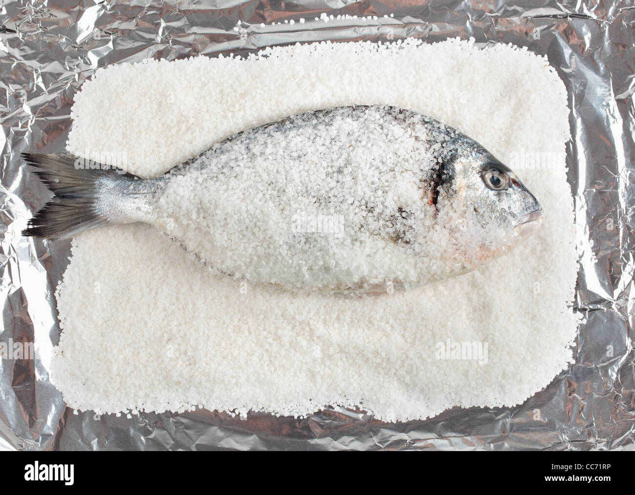 Fish covered in salt hi-res stock photography and images - Alamy