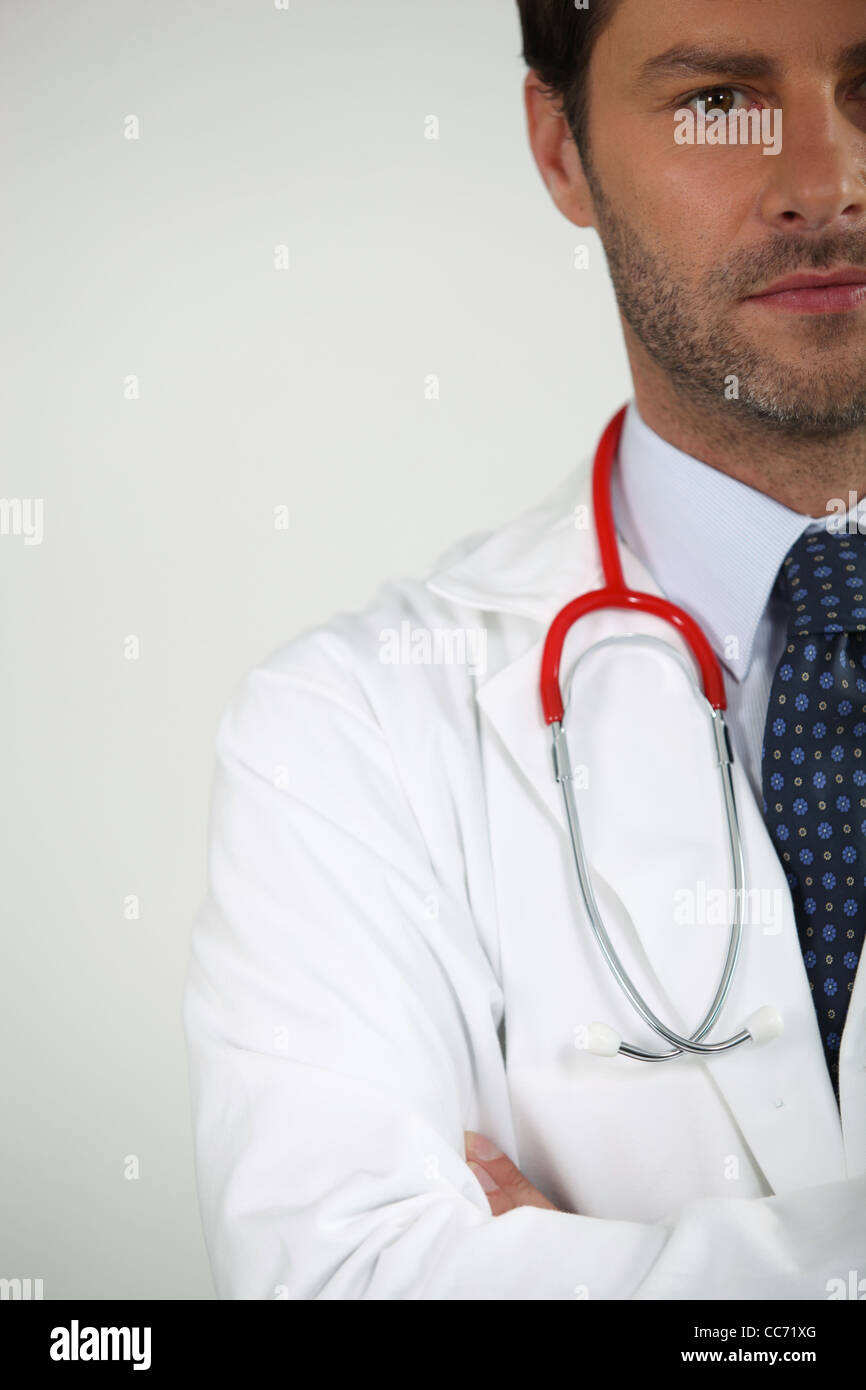 Tight closeup of a serious hospital doctor Stock Photo - Alamy