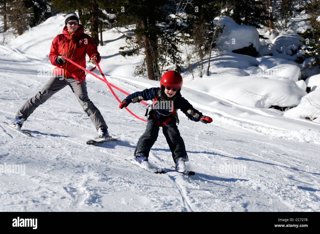 A young boy learning how to ski Stock Photo - Alamy