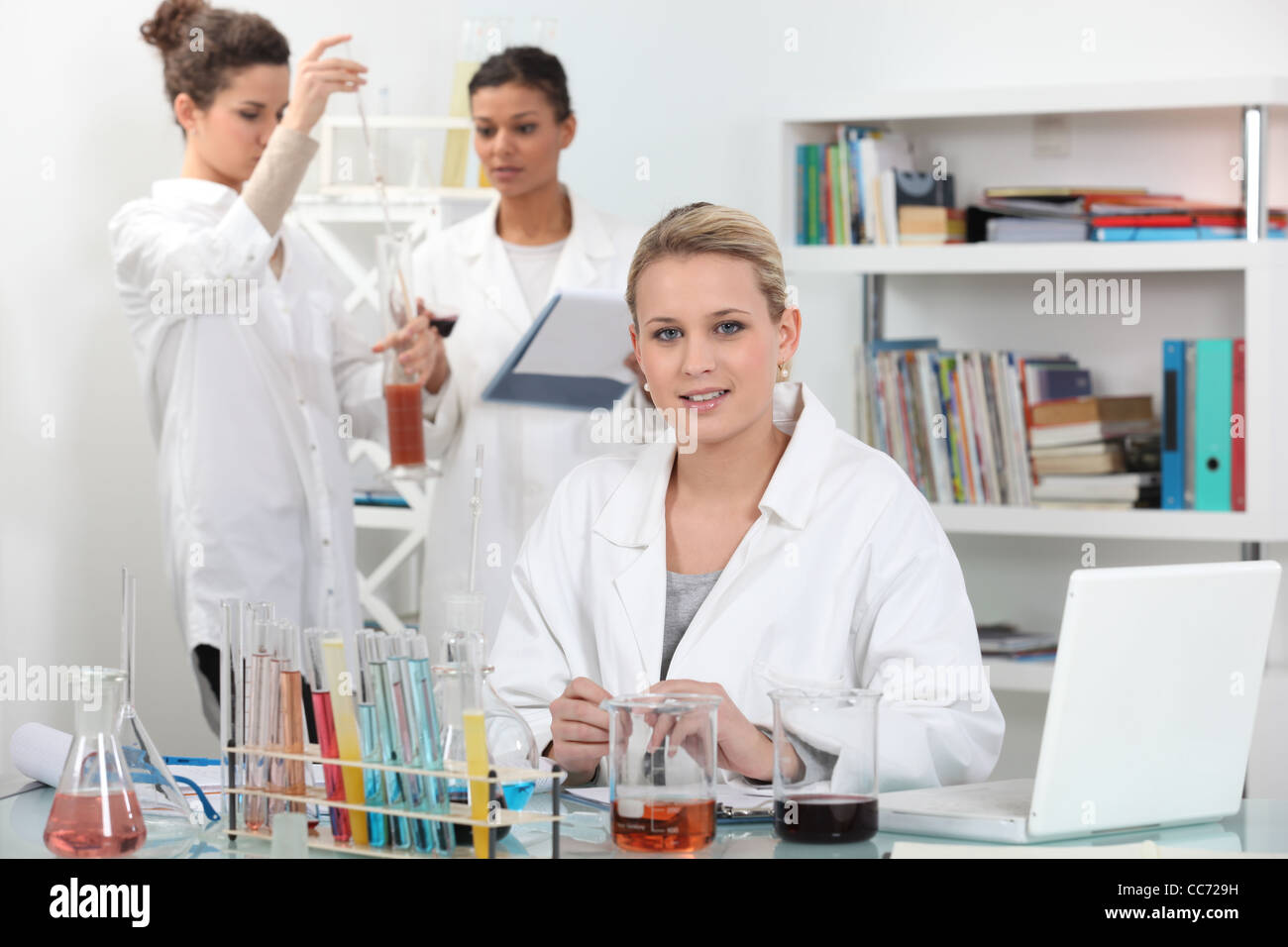 Group scientists conducting research hi-res stock photography and ...