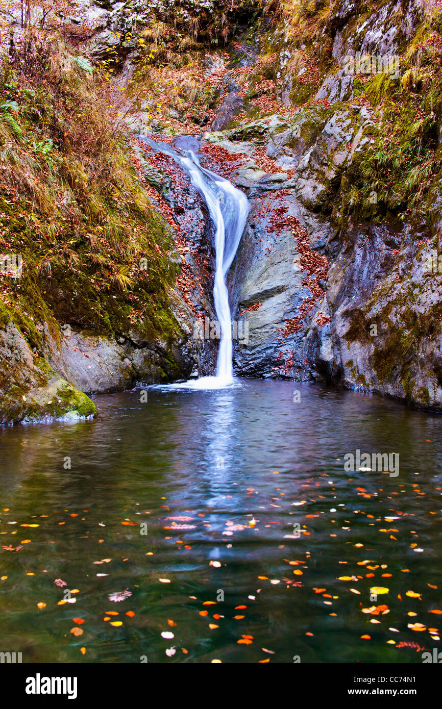 Landscape with waterfall in the mountains Stock Photo - Alamy