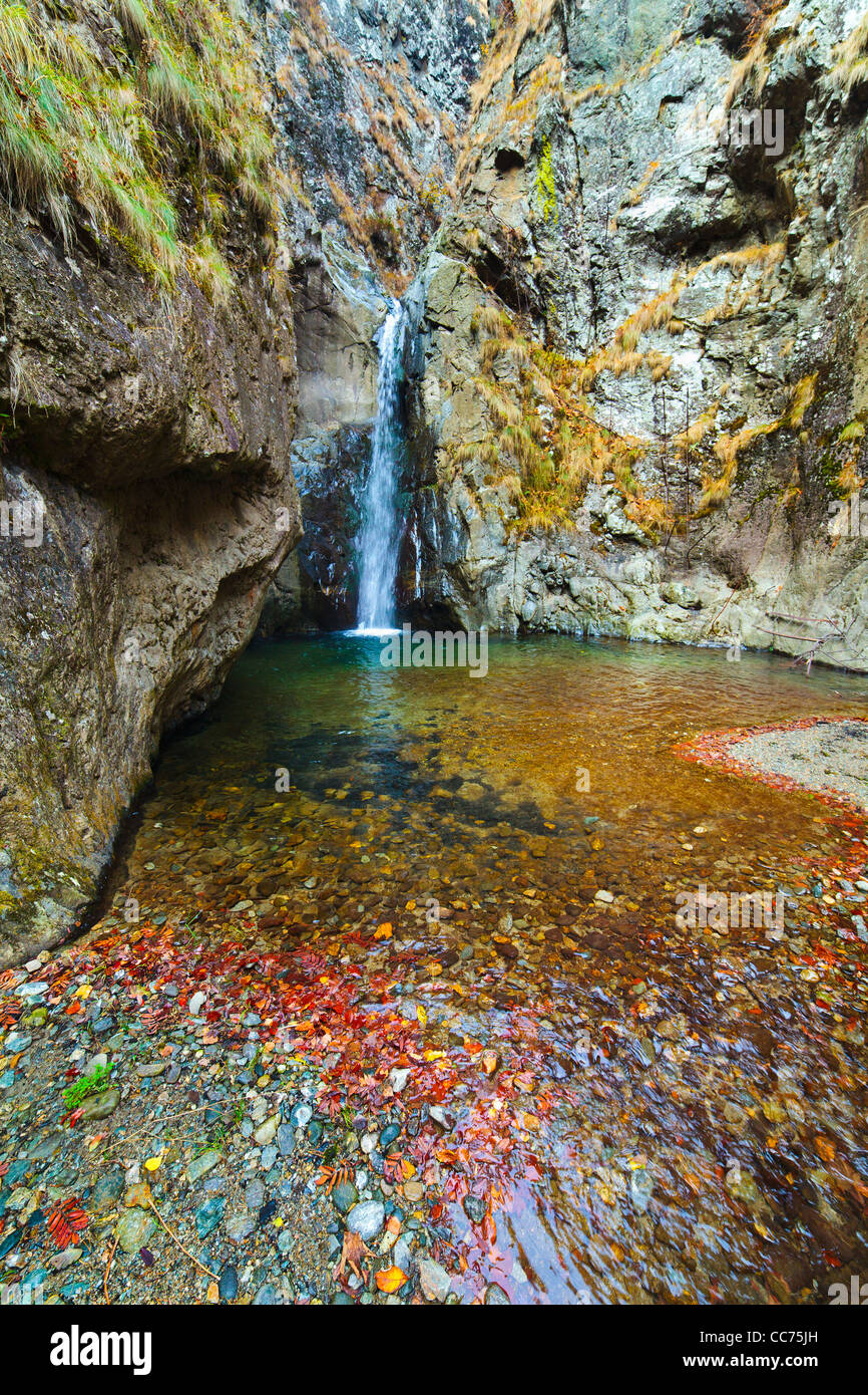 Landscape with waterfall in the mountains Stock Photo - Alamy