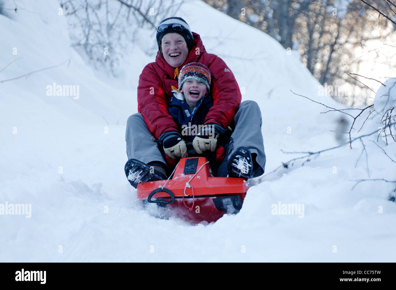 People on a sledge hi-res stock photography and images - Alamy