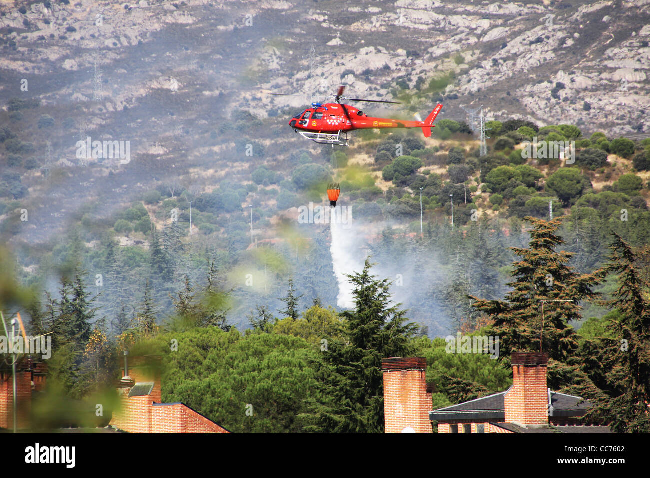 fire fighting helicopters fire on the mountain Stock Photo - Alamy