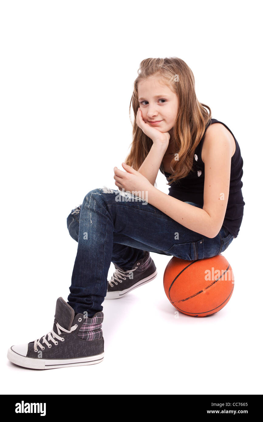 Portrait of a girl with basketball isolated on white background Stock ...