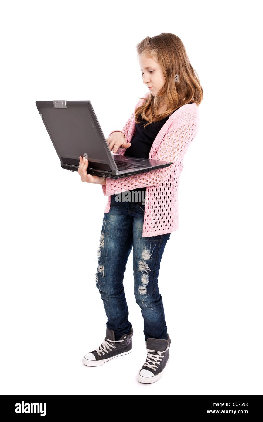 Cute girl holding a laptop isolated on white background Stock Photo - Alamy